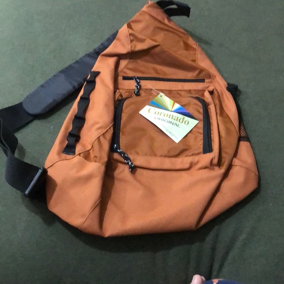 Mercury Luggage | Bags | Nwt Rust Coronado Sling Backpack | Poshmark